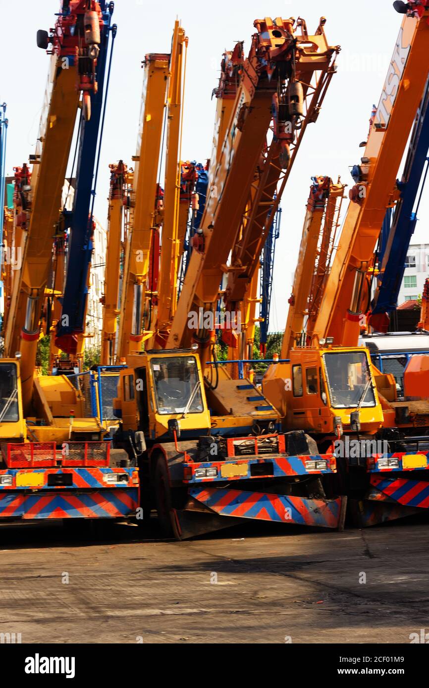 Impressive "forest" of crane arrows (gib arm of autocranes). Parade of ...