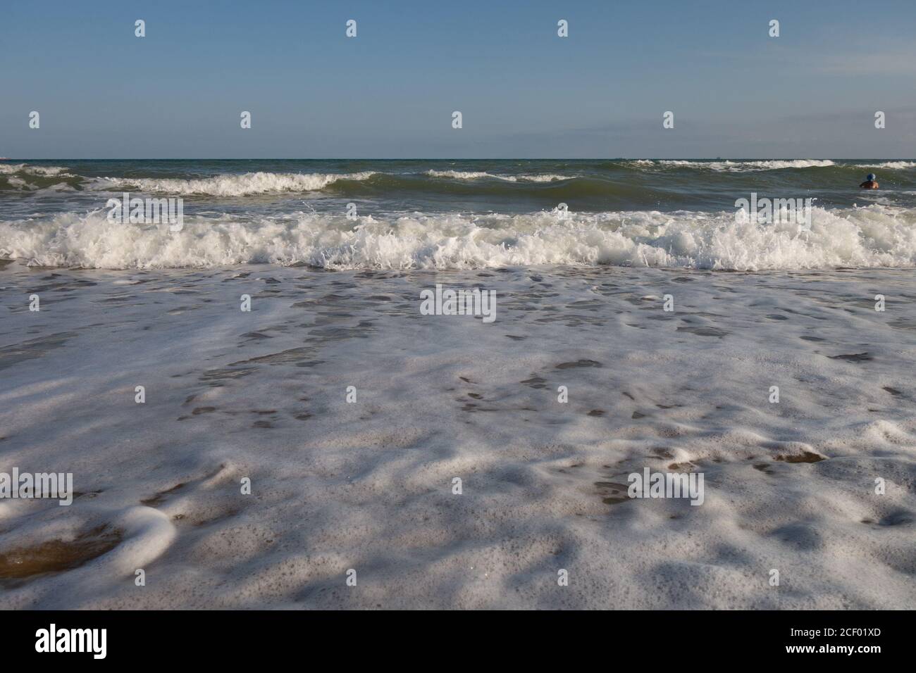 Beautiful seashore foamy waves hi-res stock photography and images - Alamy