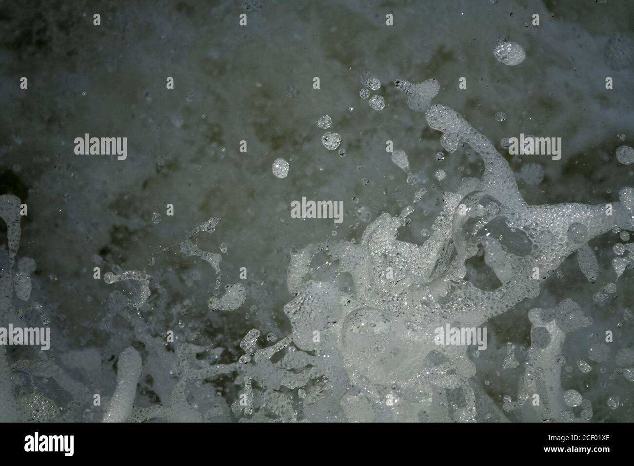 Water splashes from waterfall close-up. Beauty of clear spring water ...