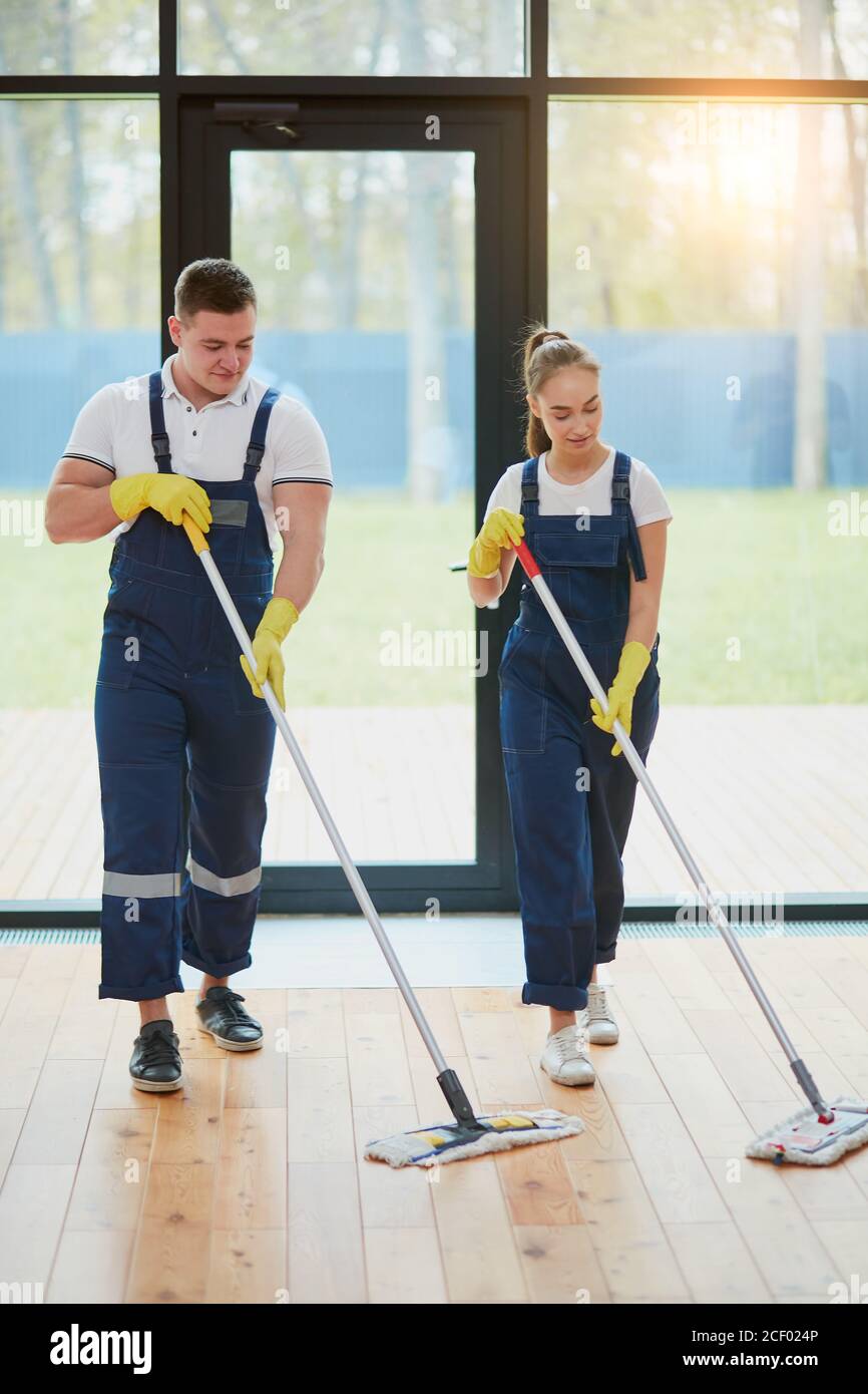 Woman washing floor mop office hi-res stock photography and images - Alamy