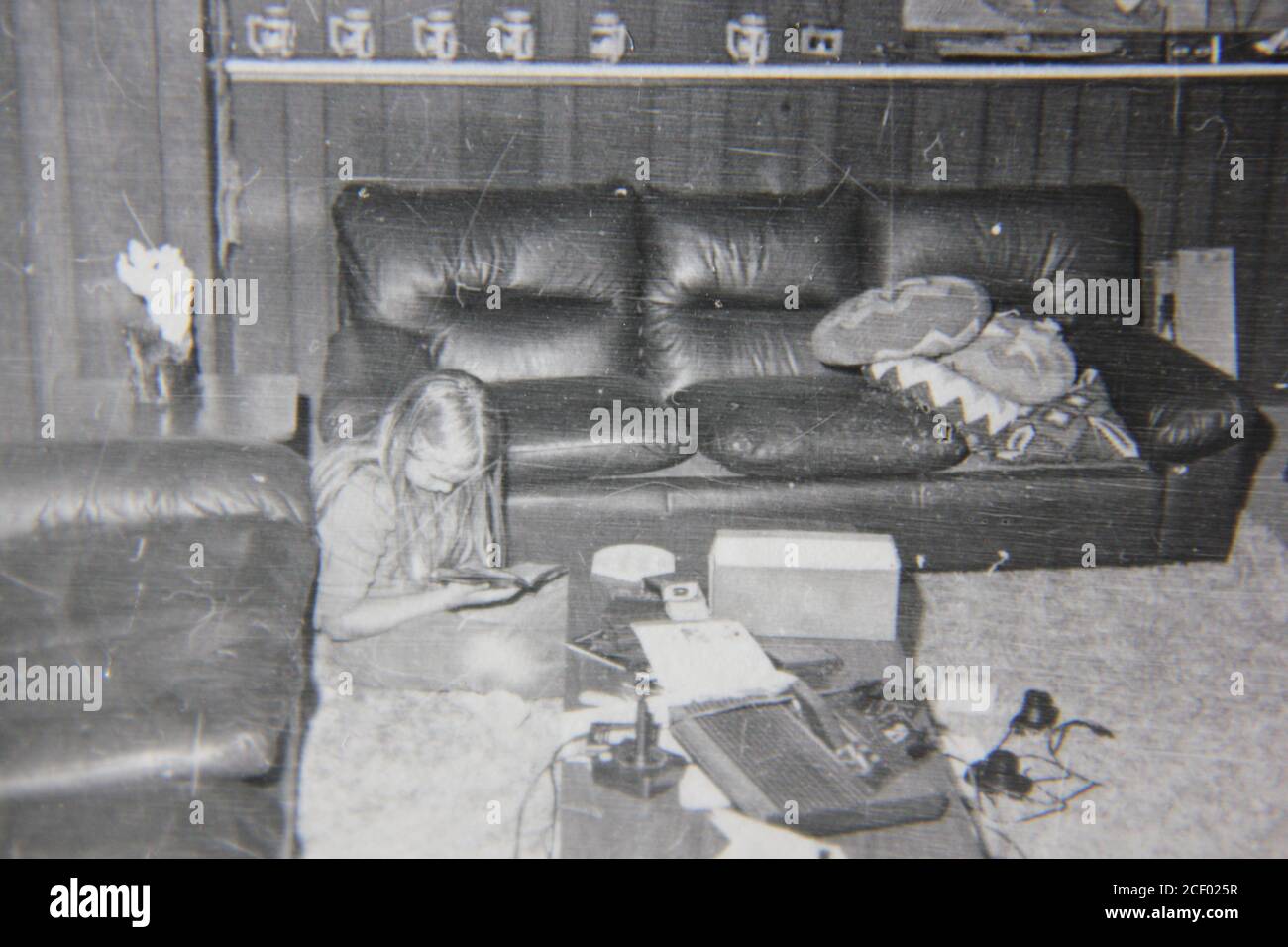 Fine 1970s vintage black and white photography of a young girl sitting ...