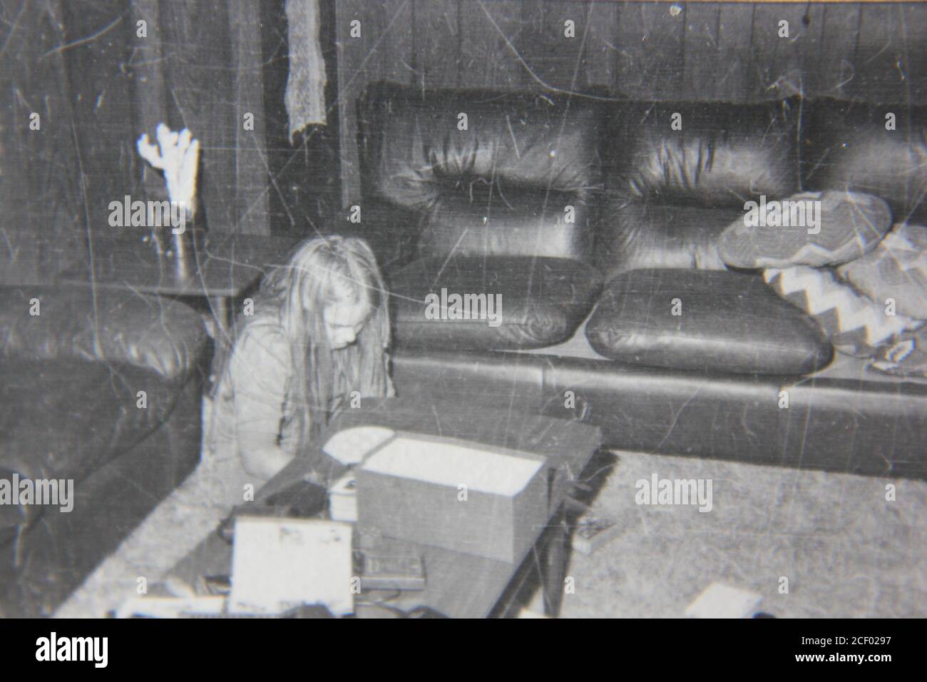 Fine 1970s vintage black and white photography of a young girl sitting ...