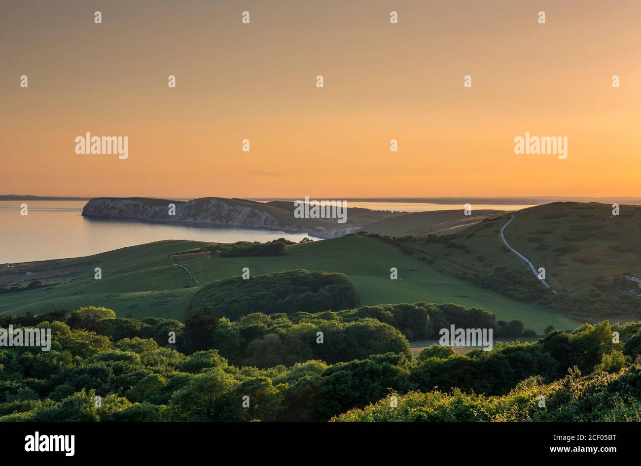A balmy summer evening at Mottistone Down overlooking over Freshwater ...