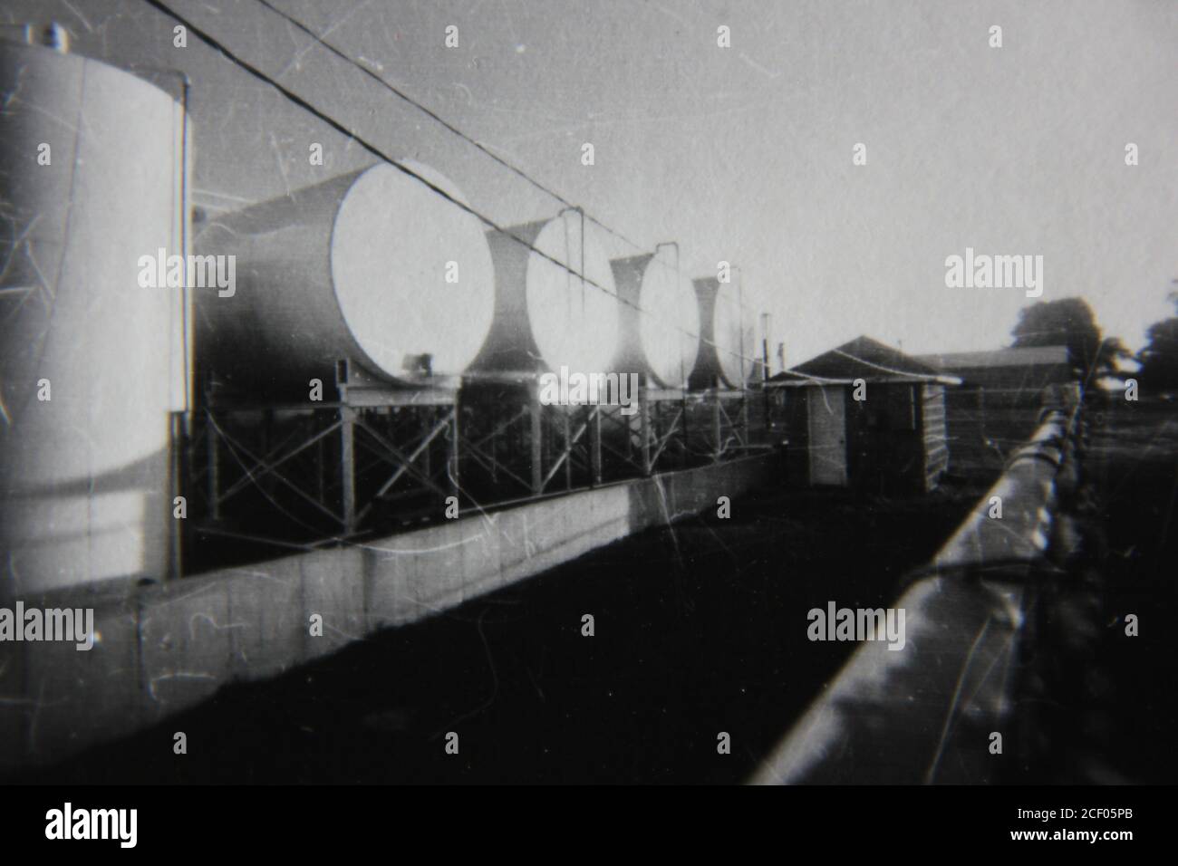 Fine 1970s vintage black and white photography of storage tanks ...