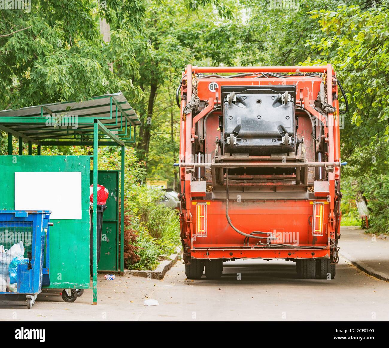Process of garbage loading to the garbage truck Stock Photo - Alamy