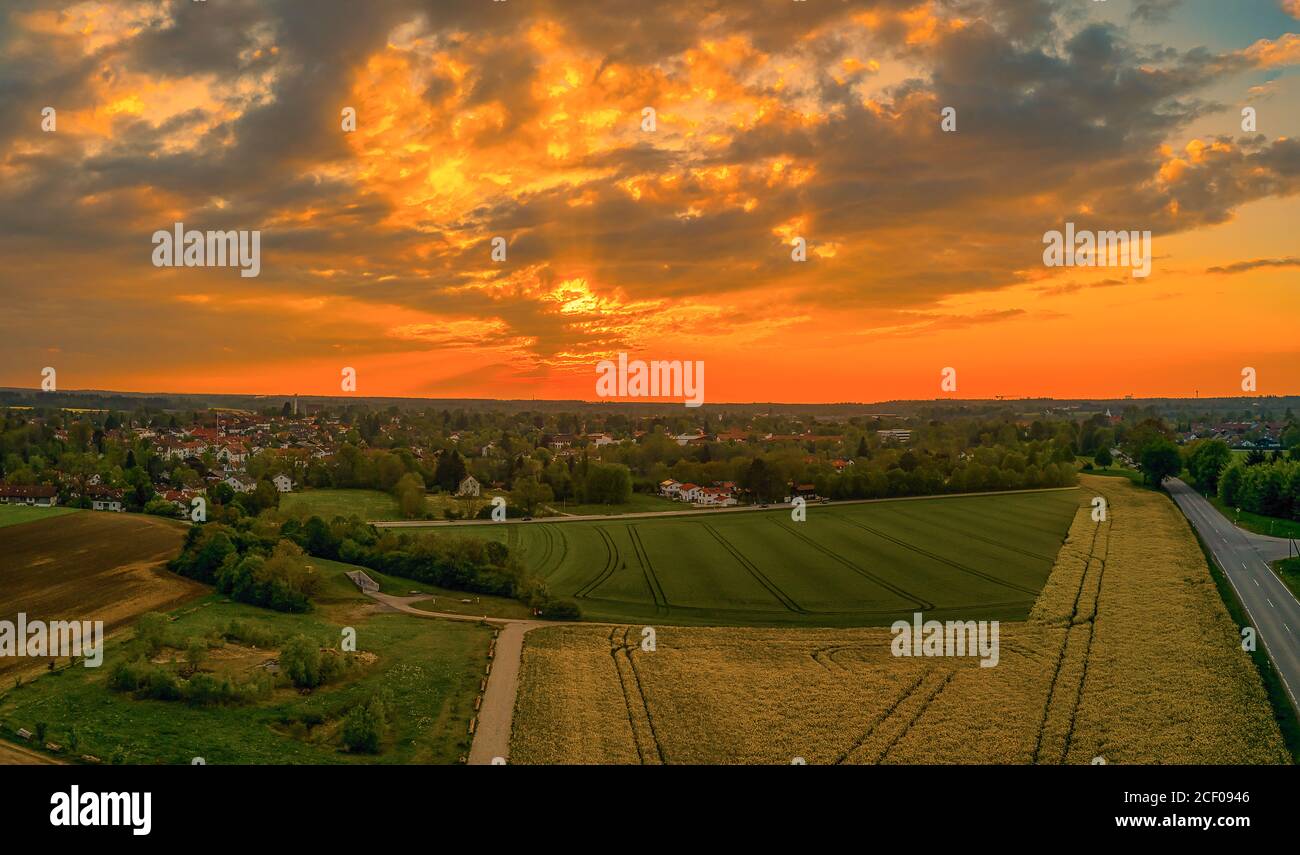 Glowing sunset next village hi-res stock photography and images - Alamy