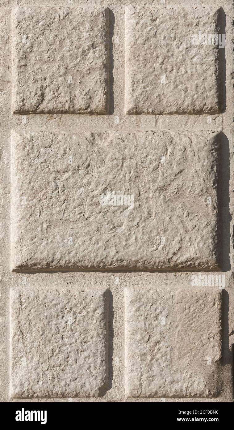 Istrian white stone ancient wall with square blocks as background ...