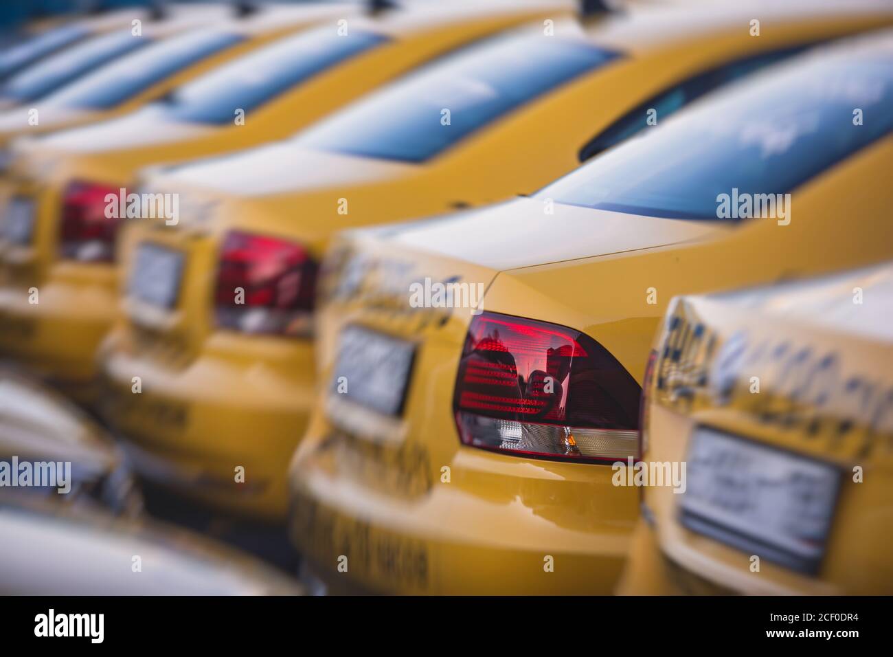 View of yellow taxi cab parking lot with yellow cars standing, set of ...