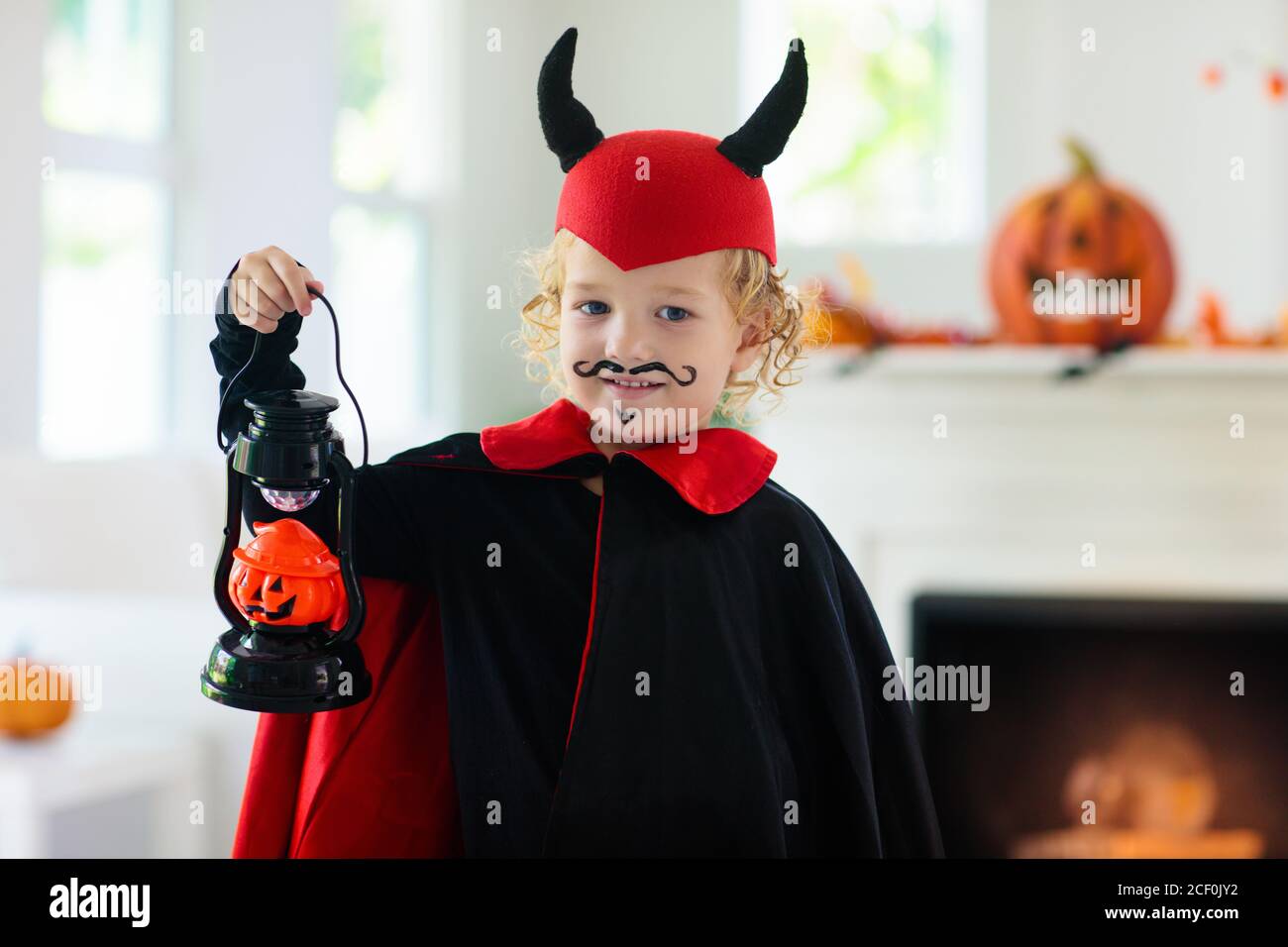 Child in Halloween costume. Kids trick or treat. Little boy dressed as ...