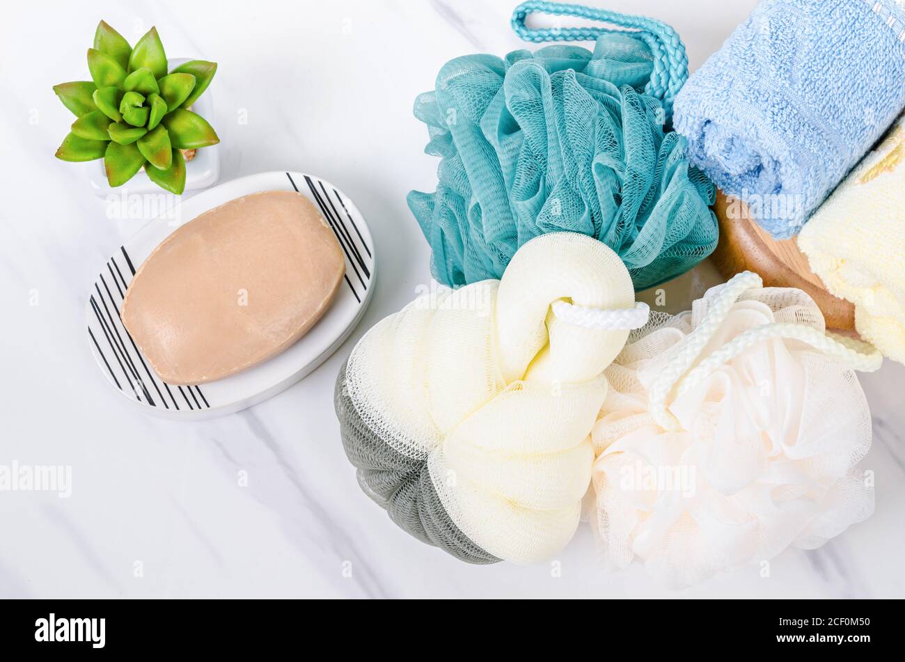 Herb soap, shower sponge inside a bright bathroom background Stock ...