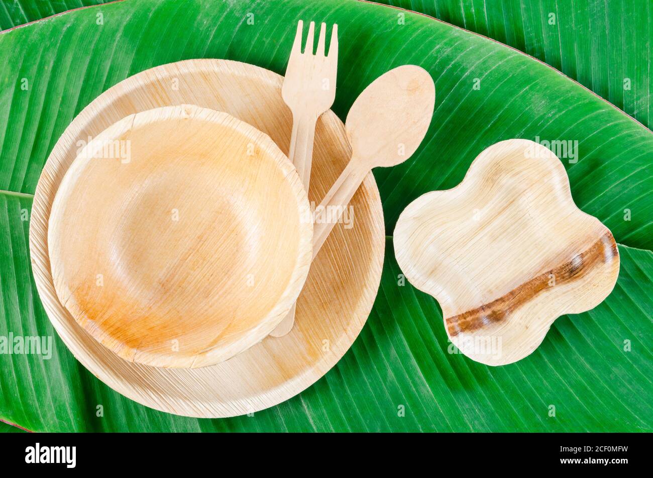 Kitchenware made from dried betel nut leaf palm, natural material. The ...