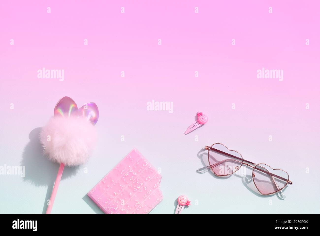 pink school stationery on pink and blue bright background.Back to ...