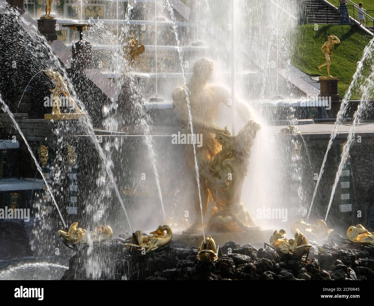 Statue of Samson tearing the mouth of a lion in the Grand Cascade of ...