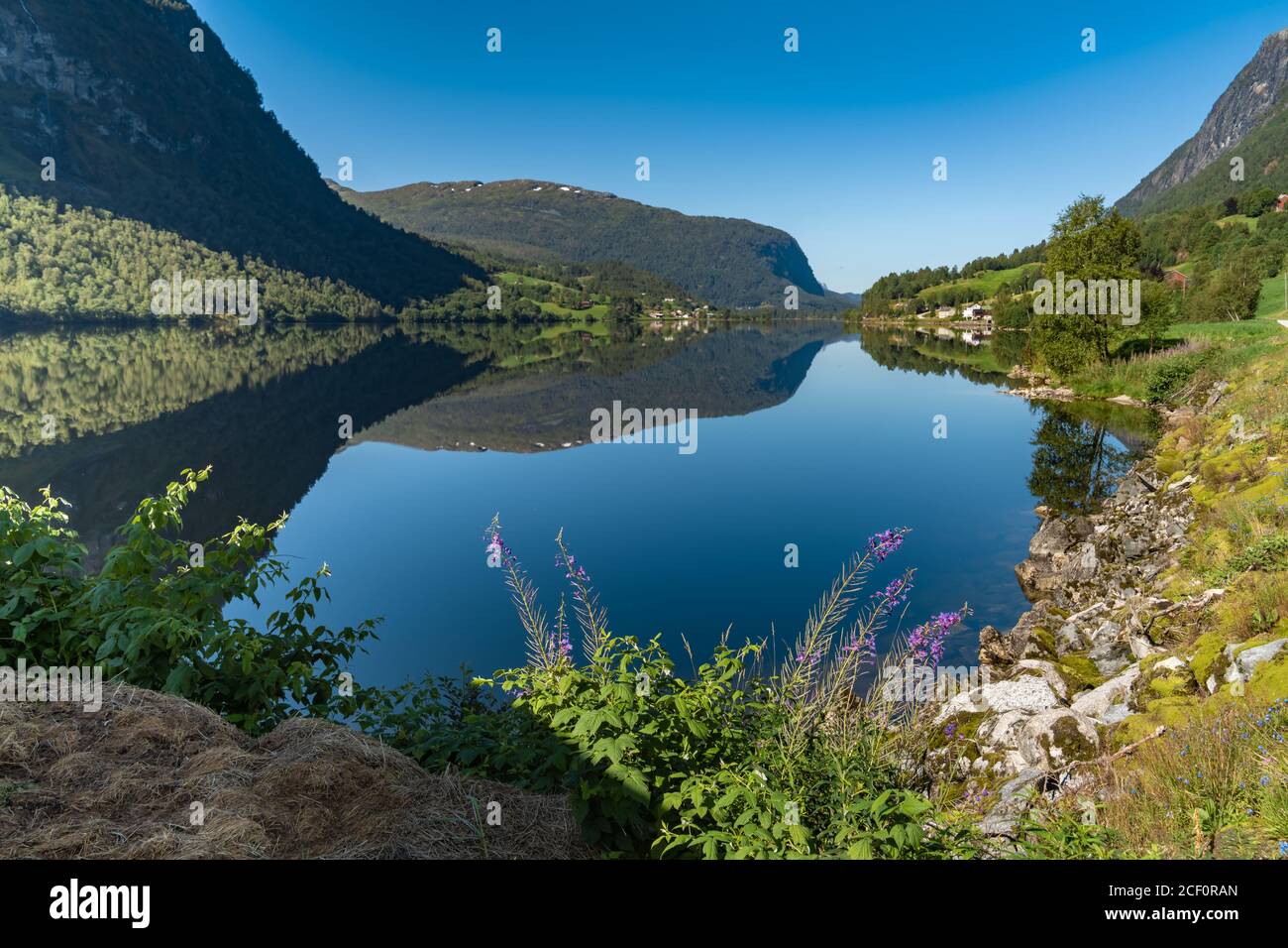 Gorgeous, mountain lake and fjord scenery along the Gaular River Valley ...