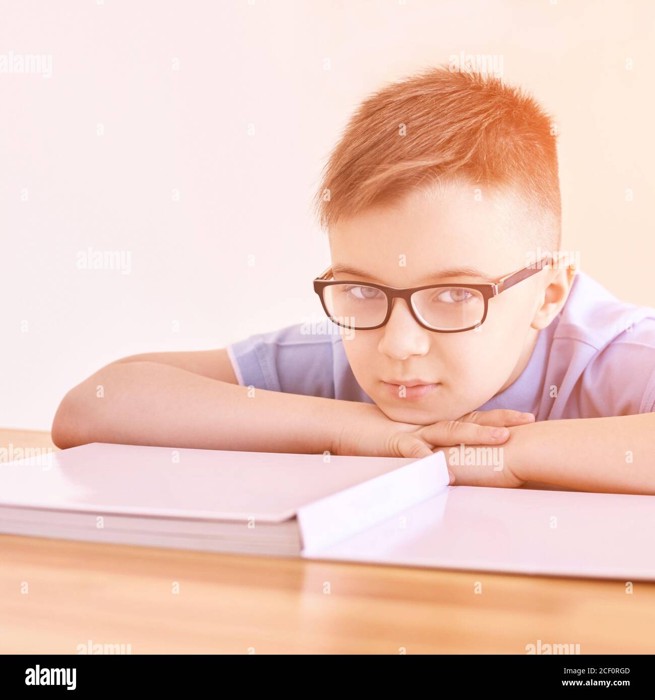 Inquisitive young schoolboy hi-res stock photography and images - Alamy