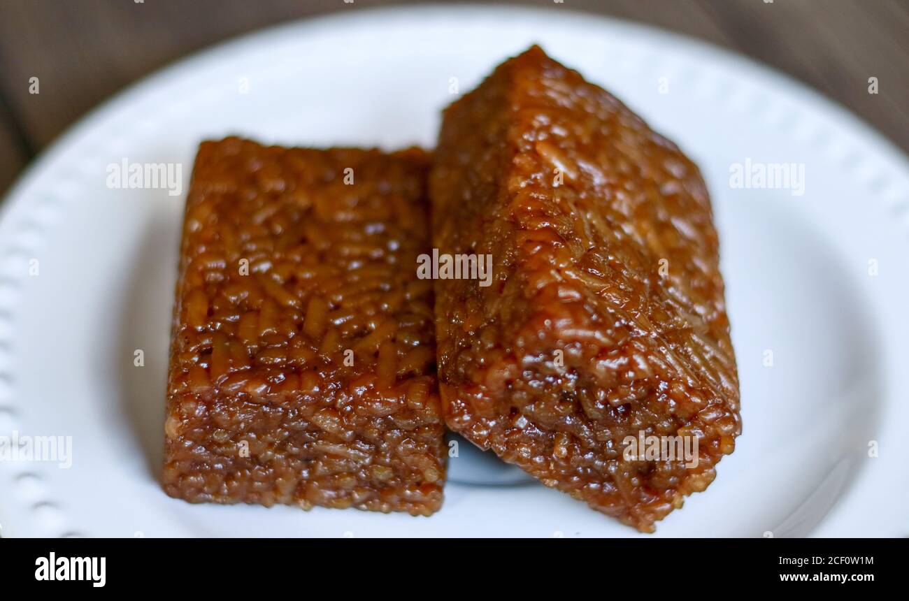 Wajik on wood background. Wajik is traditional snack made with steamed ...