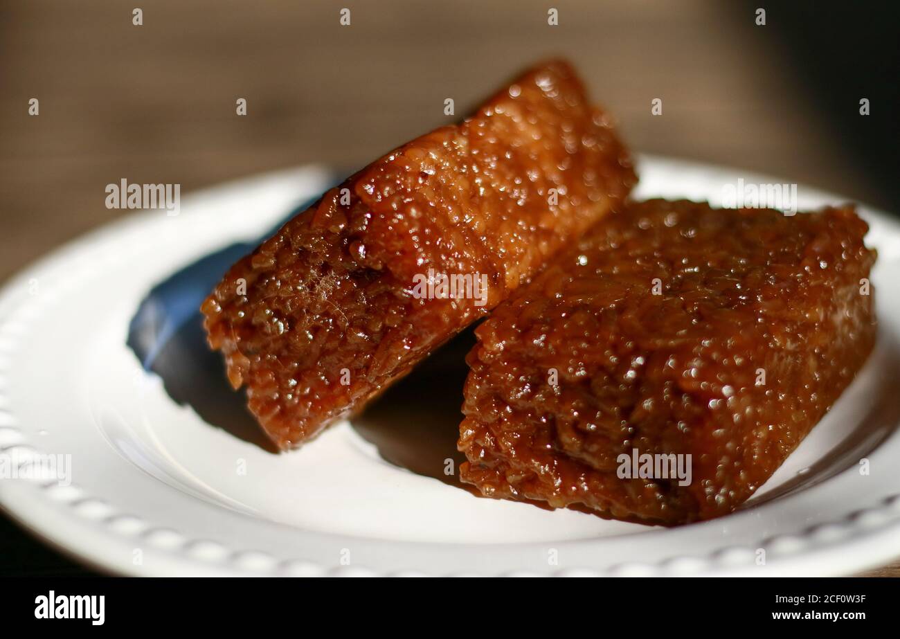 Wajik on wood background. Wajik is traditional snack made with steamed ...