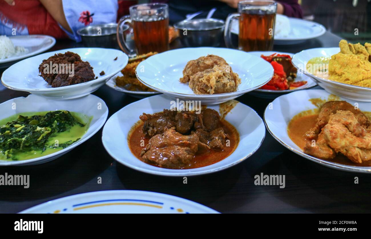 Various menu of Padang Restaurant, Indonesian food Stock Photo - Alamy