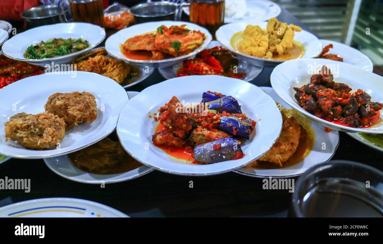 Various menu of Padang Restaurant, Indonesian food Stock Photo - Alamy