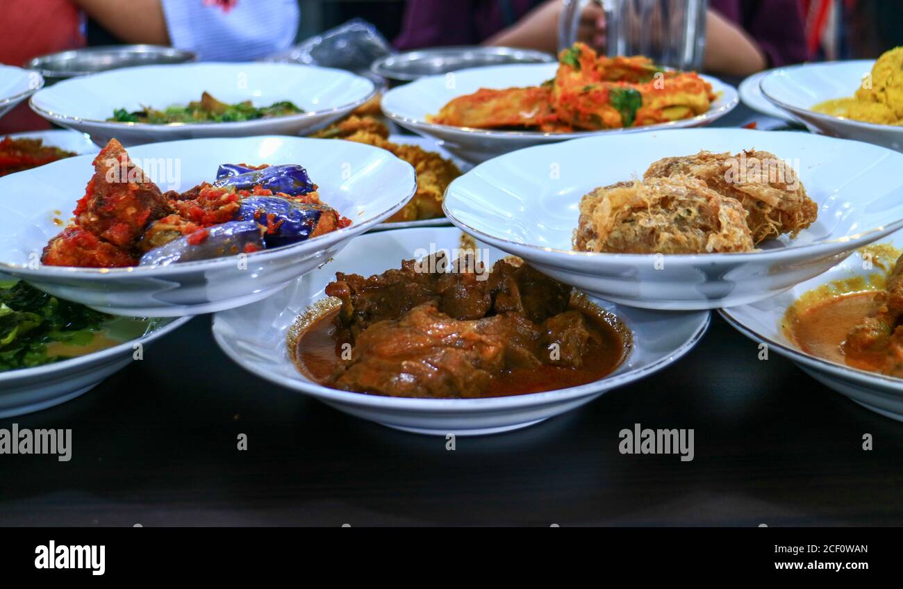 Various menu of Padang Restaurant, Indonesian food Stock Photo - Alamy