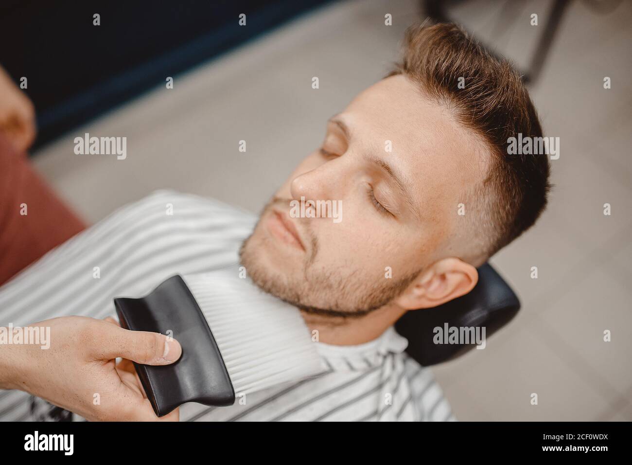 Hair dresser hairstyle guy hi-res stock photography and images - Alamy