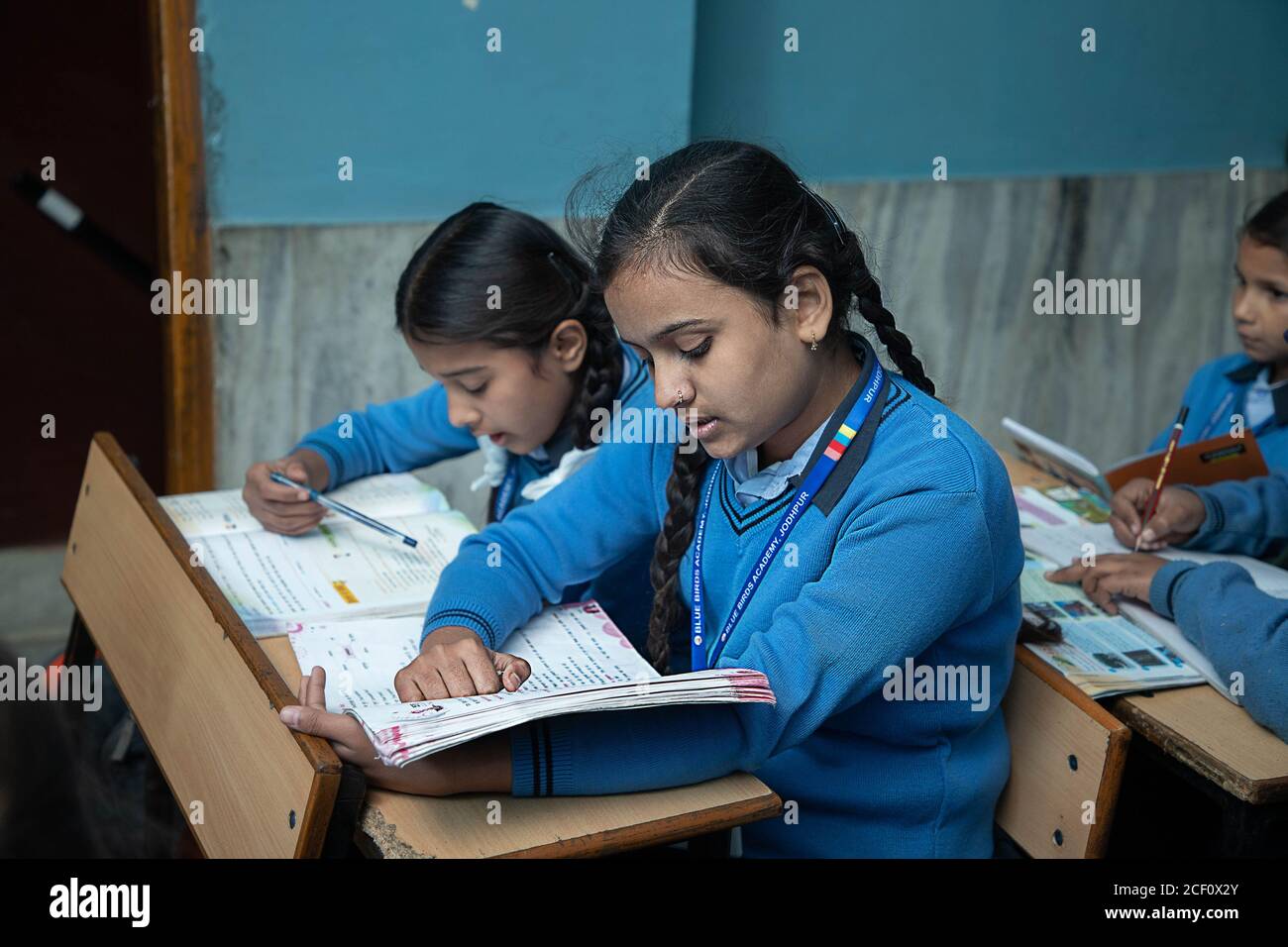 Students writing in notebooks hi-res stock photography and images - Alamy