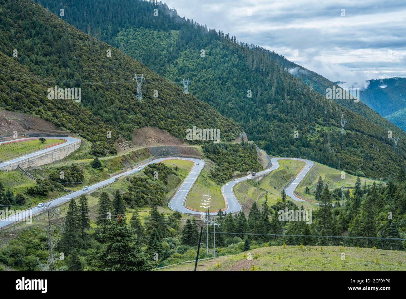 The winding up road in mountains in TIbet Stock Photo - Alamy