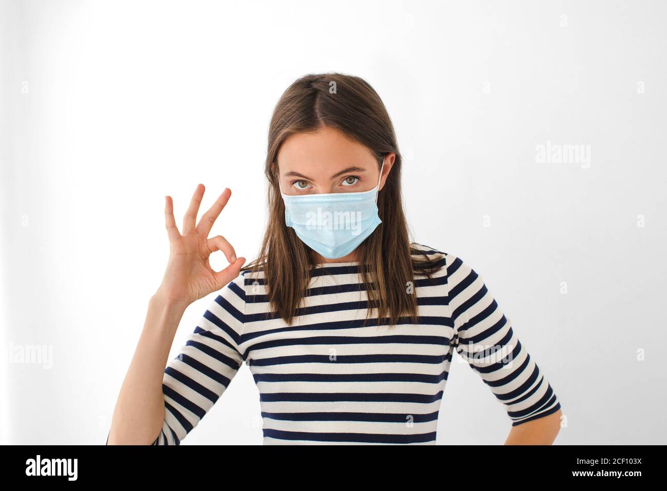 Female with mask hi-res stock photography and images - Alamy
