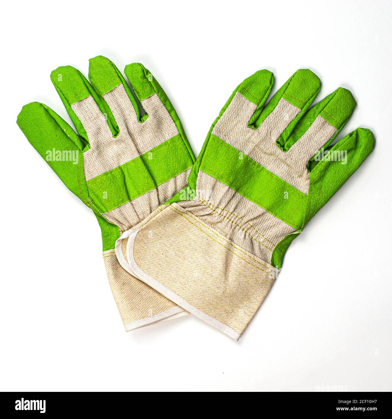 pair of work gloves with green accents on a white background Stock ...