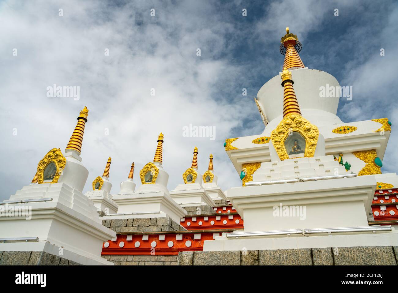 A row of white pagoda towers in Tibet, China Stock Photo - Alamy