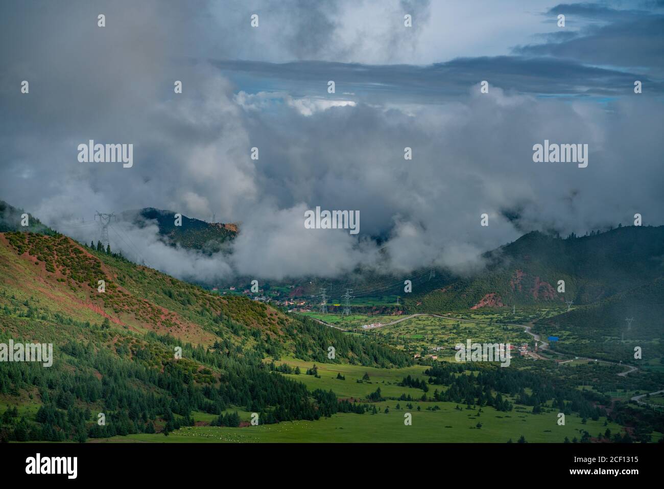 A tibetan village in mountain valley, summer time Stock Photo - Alamy