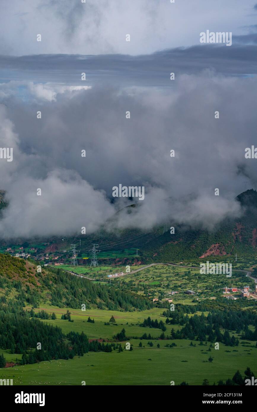 A tibetan village in mountain valley, summer time Stock Photo - Alamy