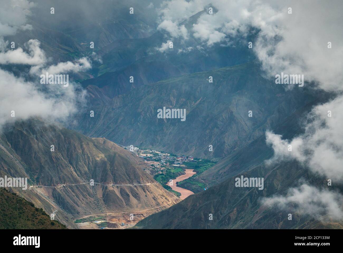 A samll village in mountain valley in Tibet, China Stock Photo - Alamy