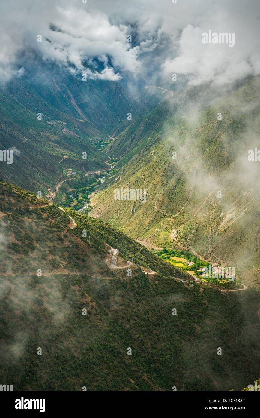 A samll village in mountain valley in Tibet, China Stock Photo - Alamy