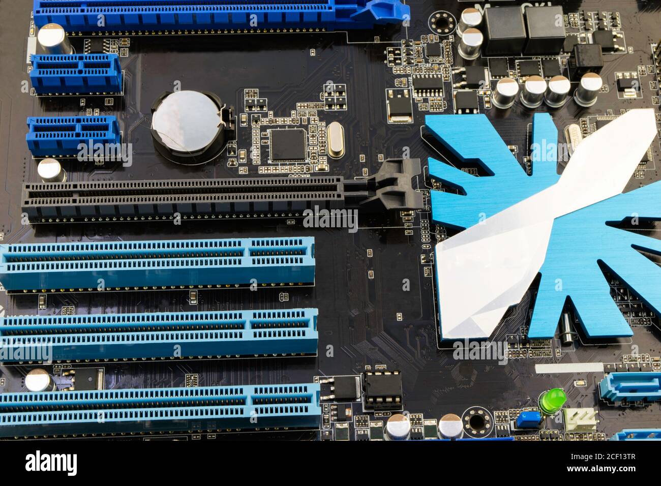 computer motherboard, with processor and other parts installed on it ...