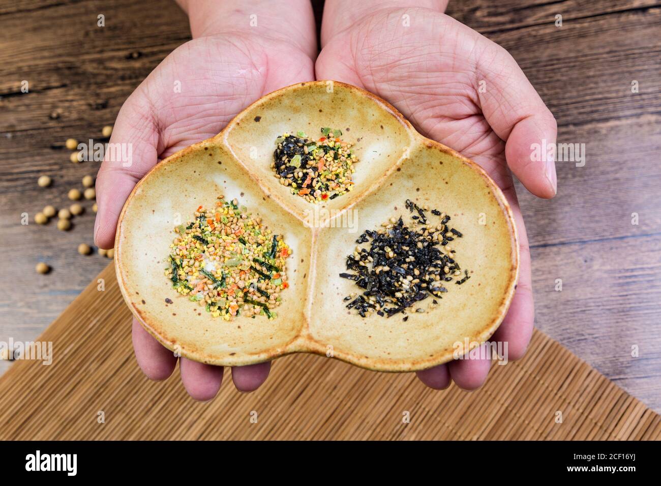Bibimbap hands hi-res stock photography and images - Alamy