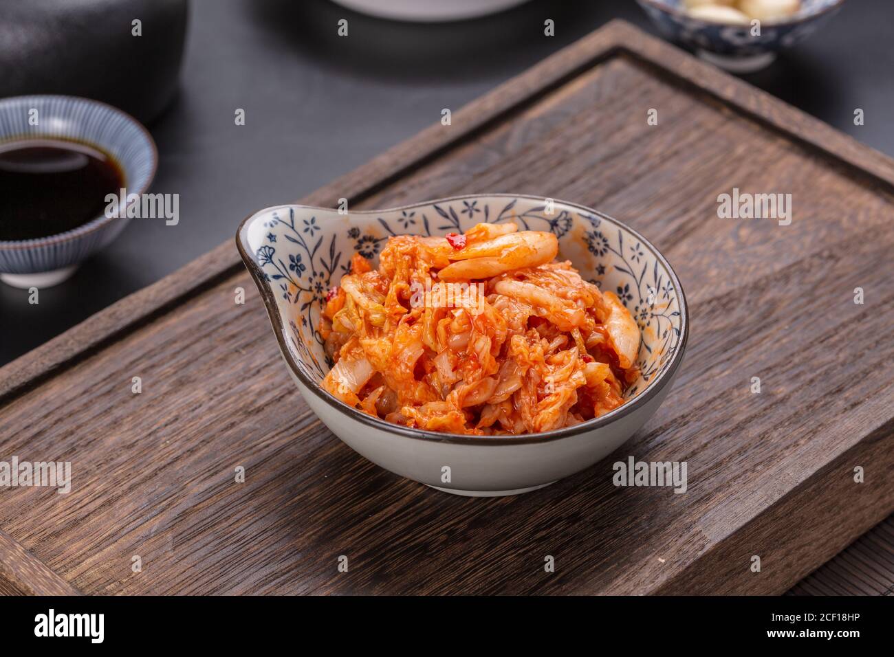 Kimchi on wooden table, Korean Stock Photo - Alamy