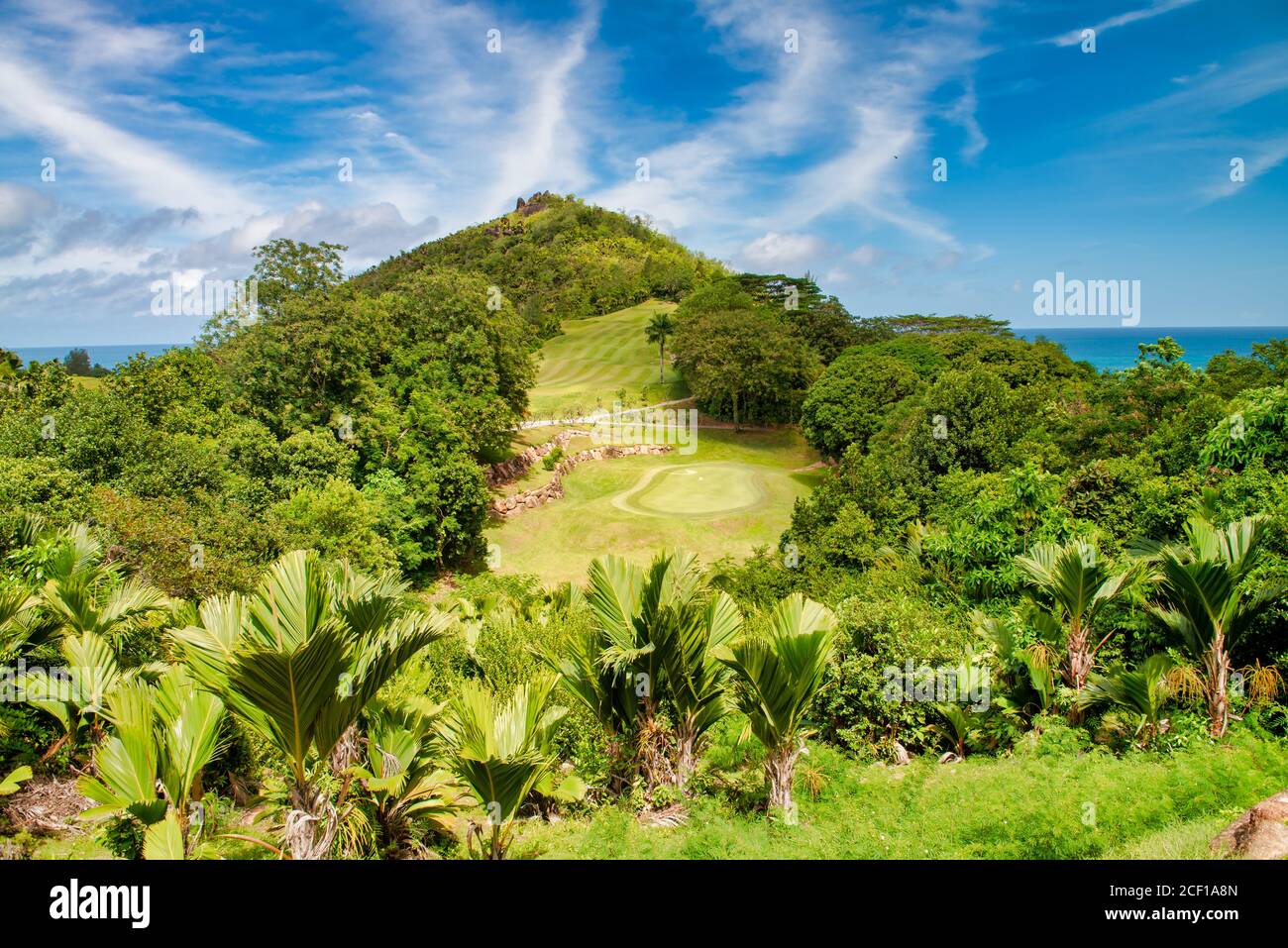 Golf course on a beautiful tropical island Stock Photo - Alamy