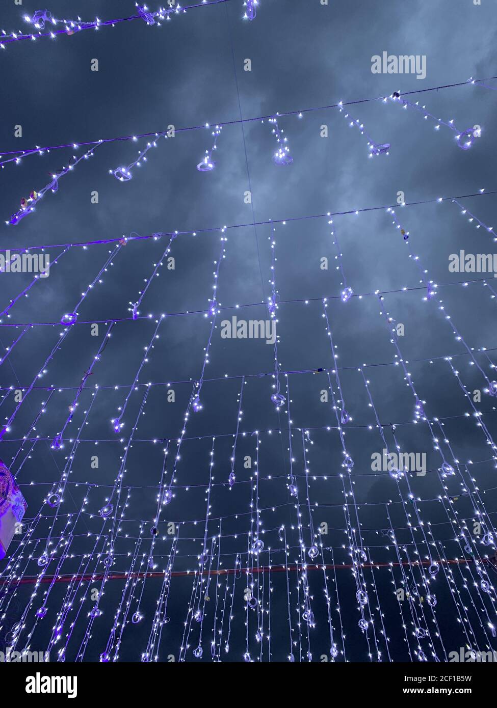 Low angle show of the glowing lights on the ropes Stock Photo - Alamy