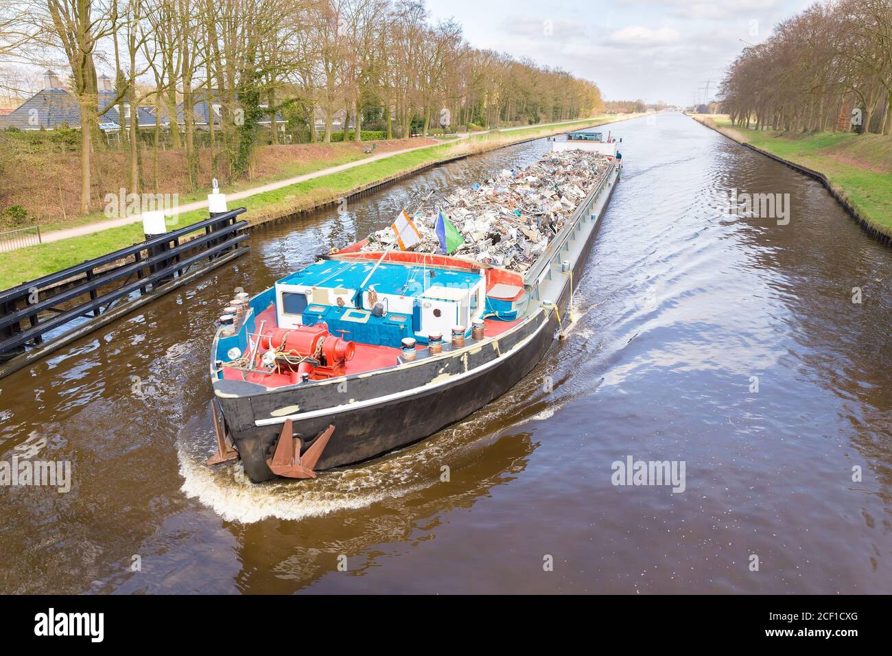Dutch cargo ship sailing with recyclable metal on channel Stock Photo ...