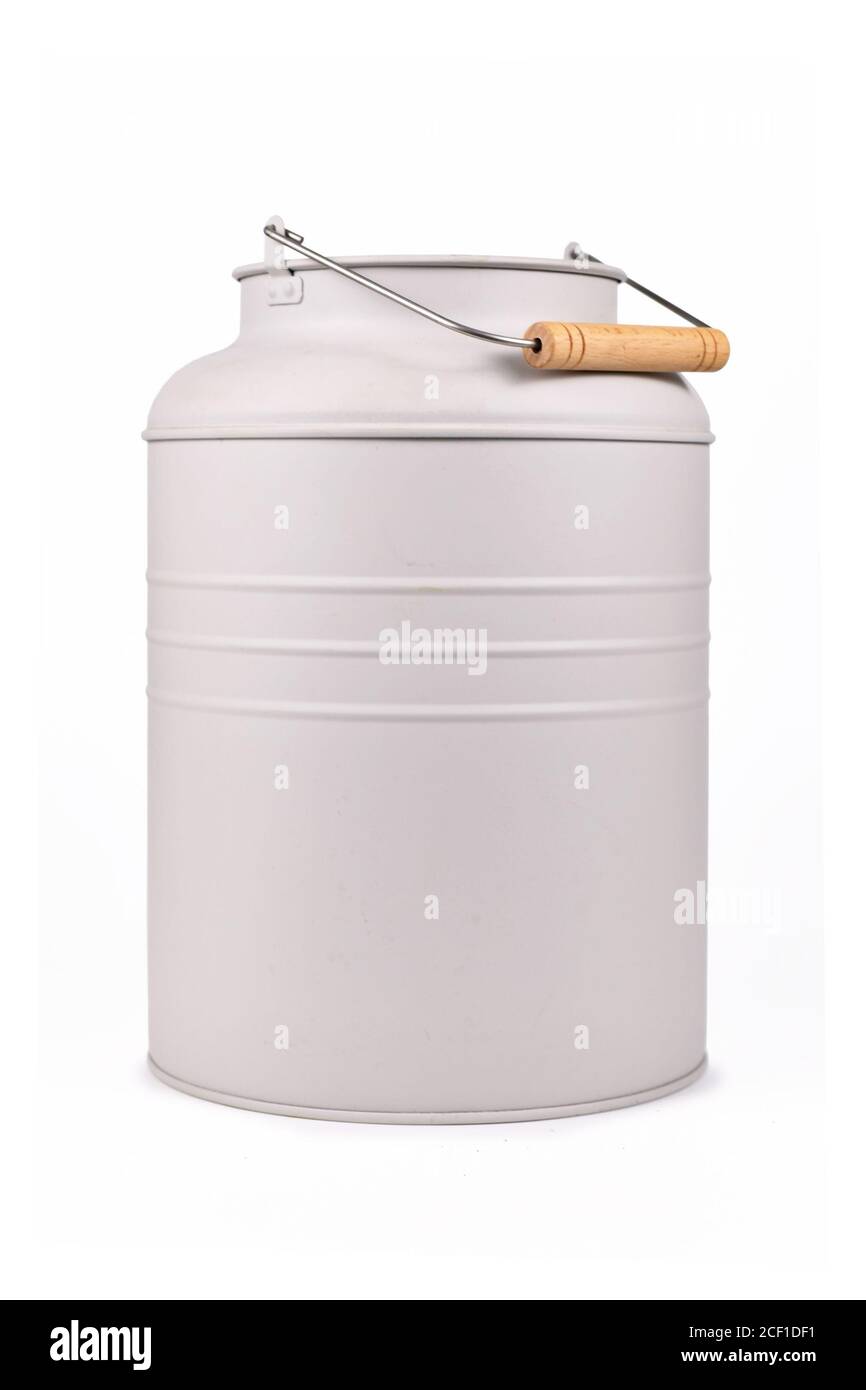 Light gray milk can with wooden handle isolated on white background ...
