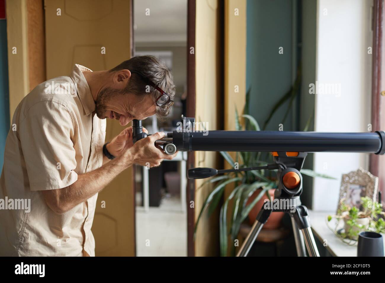 Watching stars through telescope hi-res stock photography and images ...