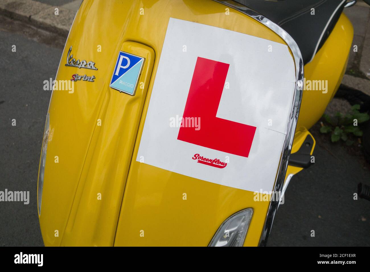 L Plates on an iconic, yellow, Vespa Piaggio Sprint Stock Photo - Alamy