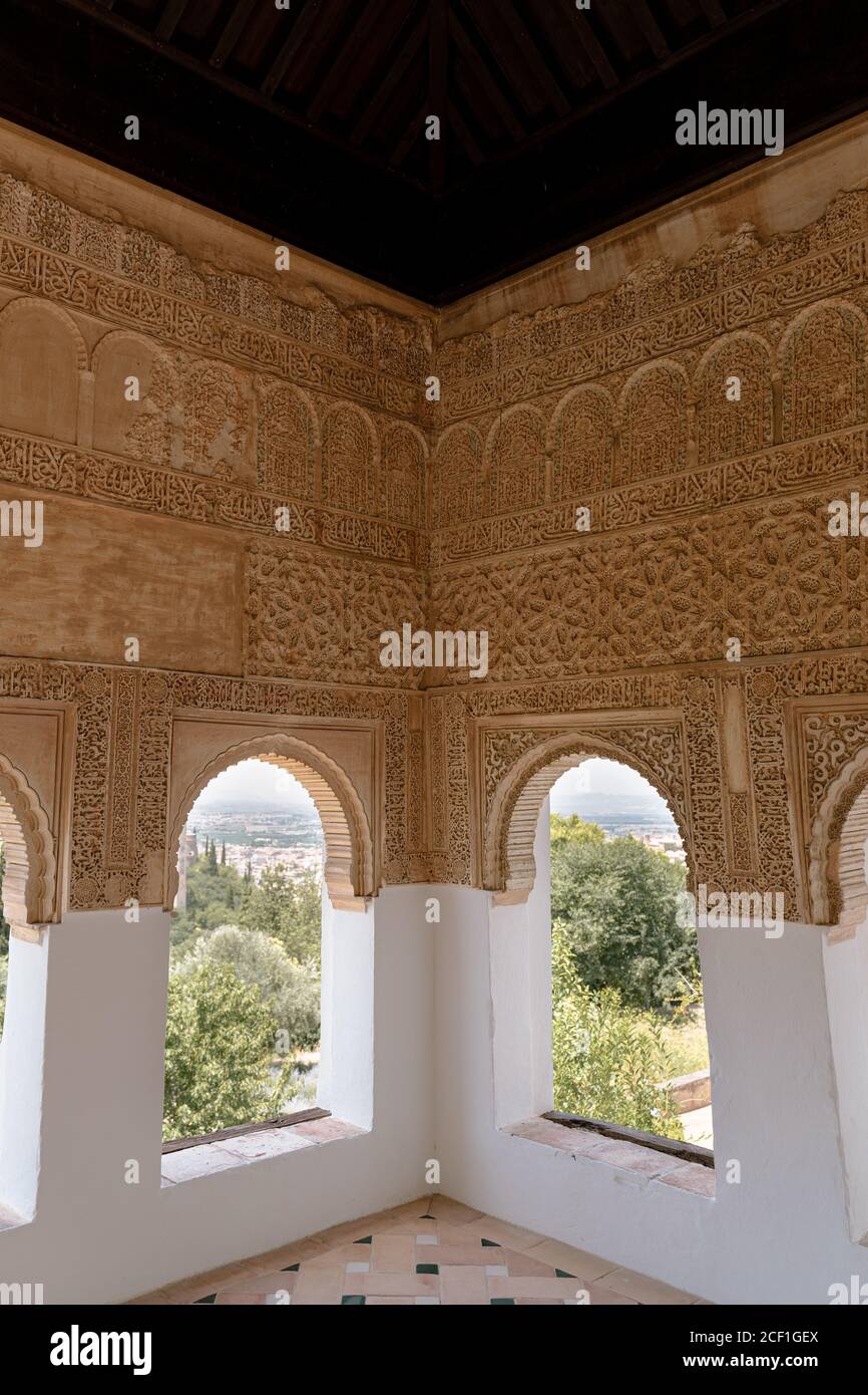 Vertical shot of the windows of the Alhambra Palace in Granada, Spain ...
