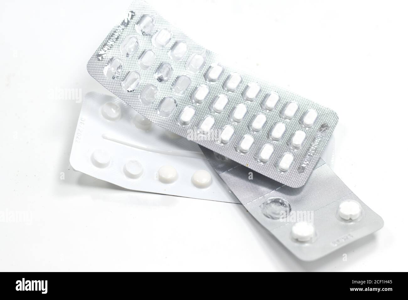 Pills tablets for lowering blood pressure isolated on a white ...