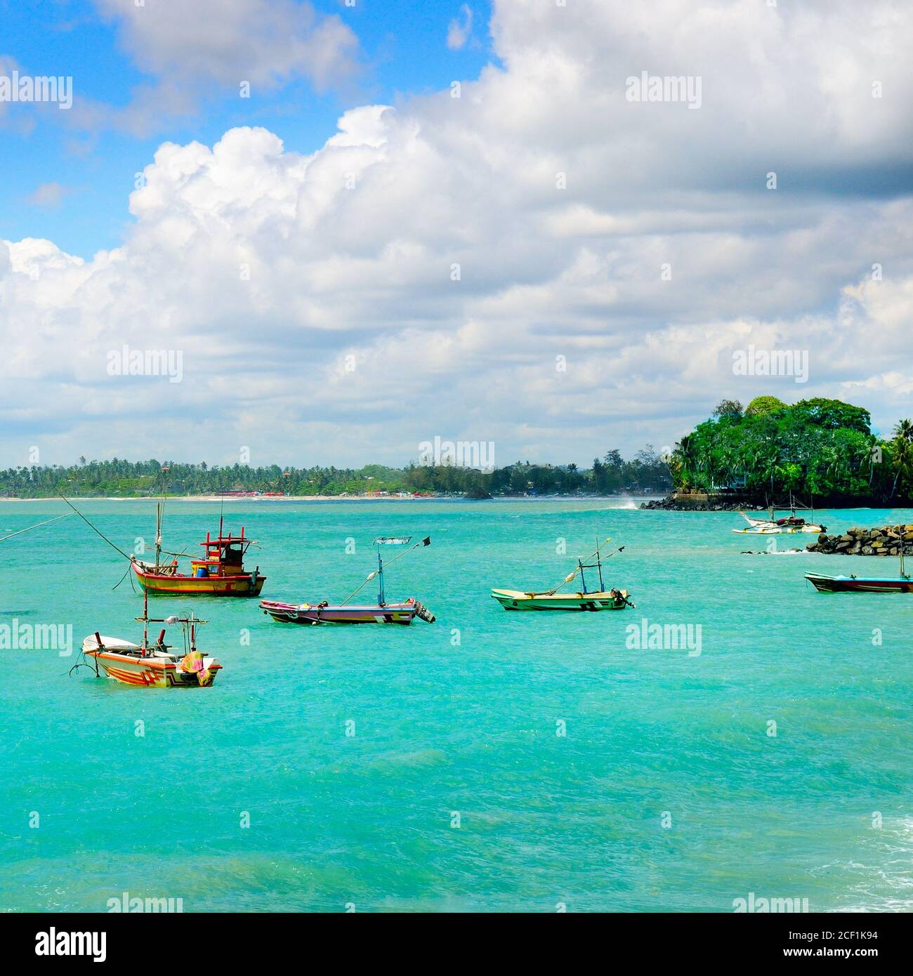 Traditional wooden fishing boats in the ocean, Asia Stock Photo - Alamy