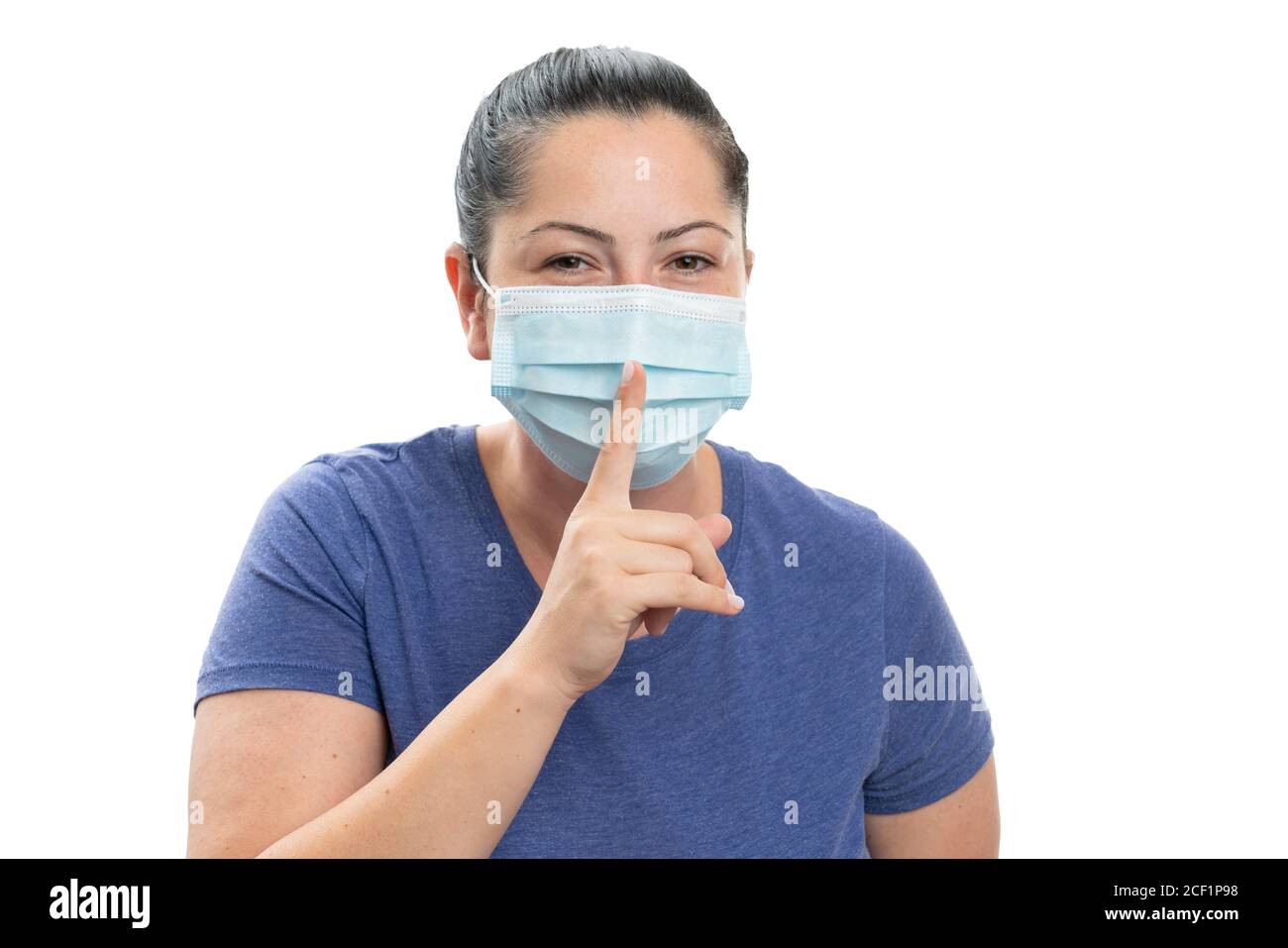 Female model making shush gesture with index finger over mouth wearing ...