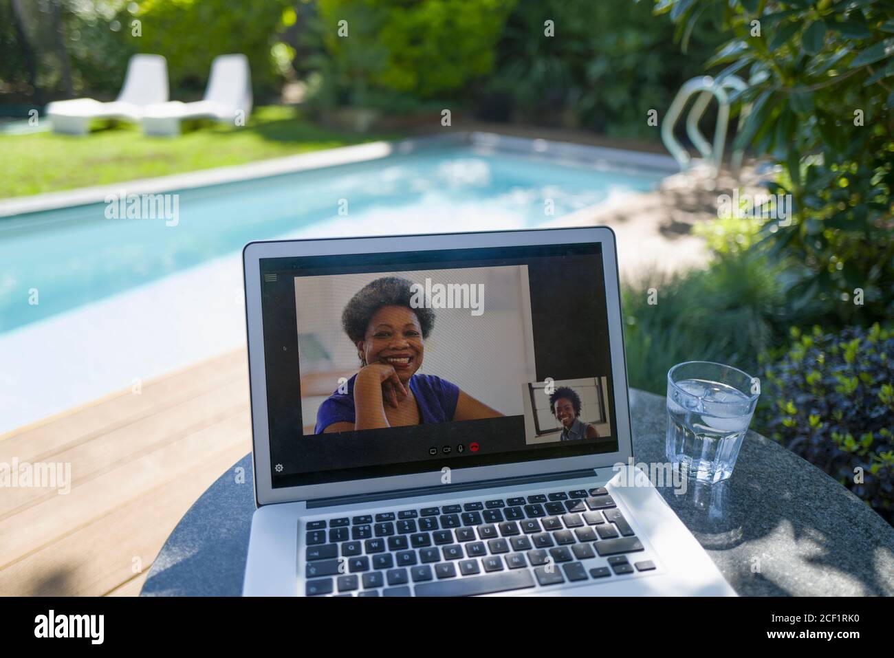 Two women at poolside hi-res stock photography and images - Alamy