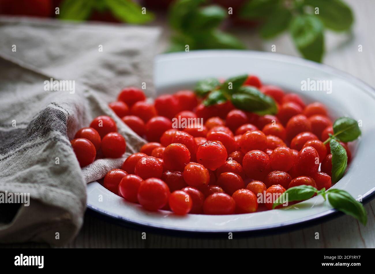 Fresh small tomato hi-res stock photography and images - Alamy