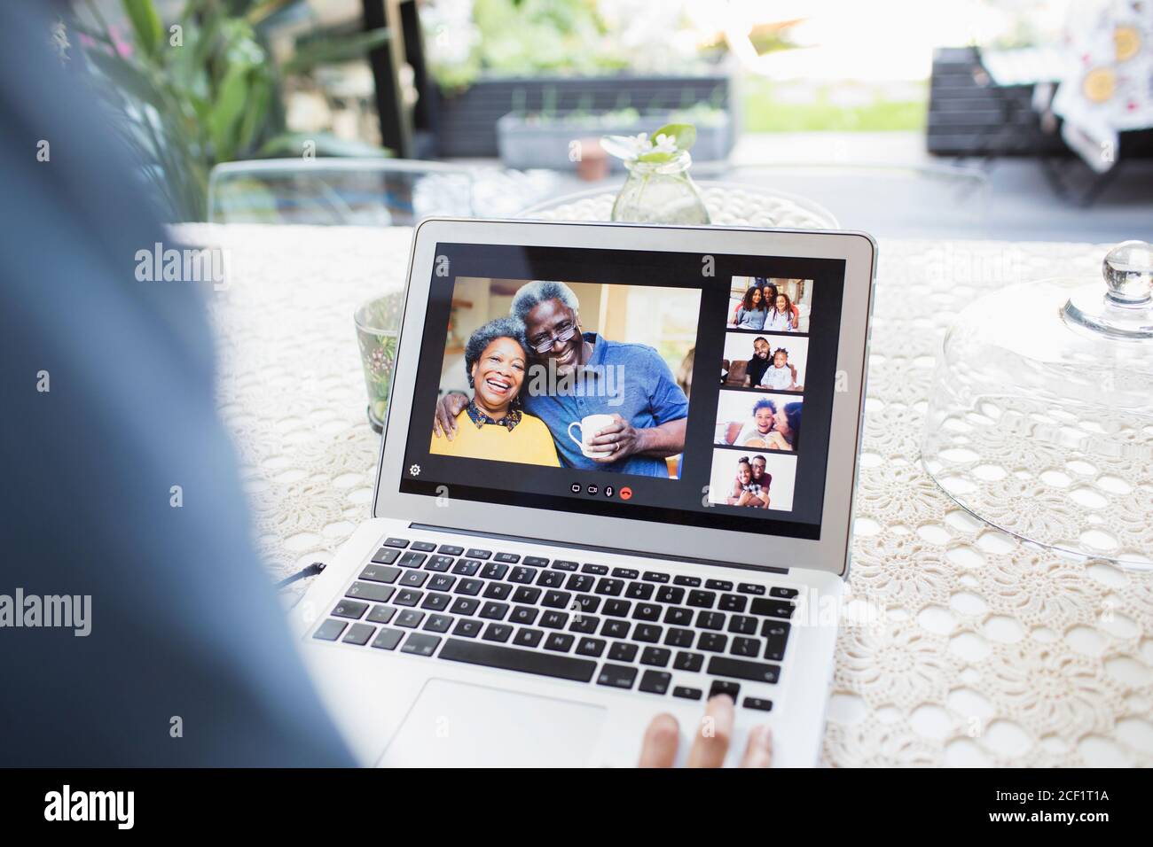 Family and friends video conferencing on laptop screen Stock Photo - Alamy
